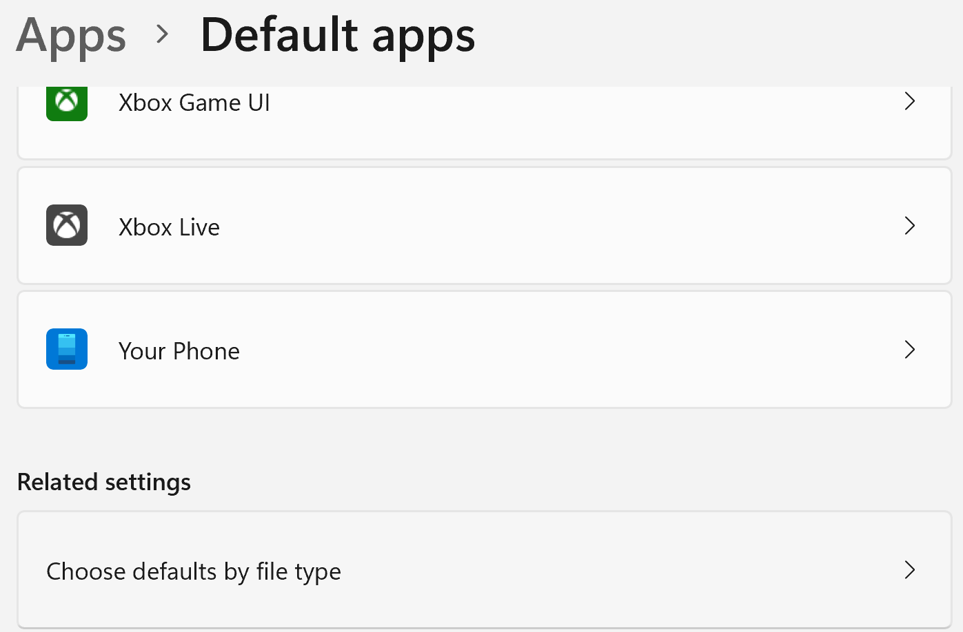How do I set default apps in Windows 11?